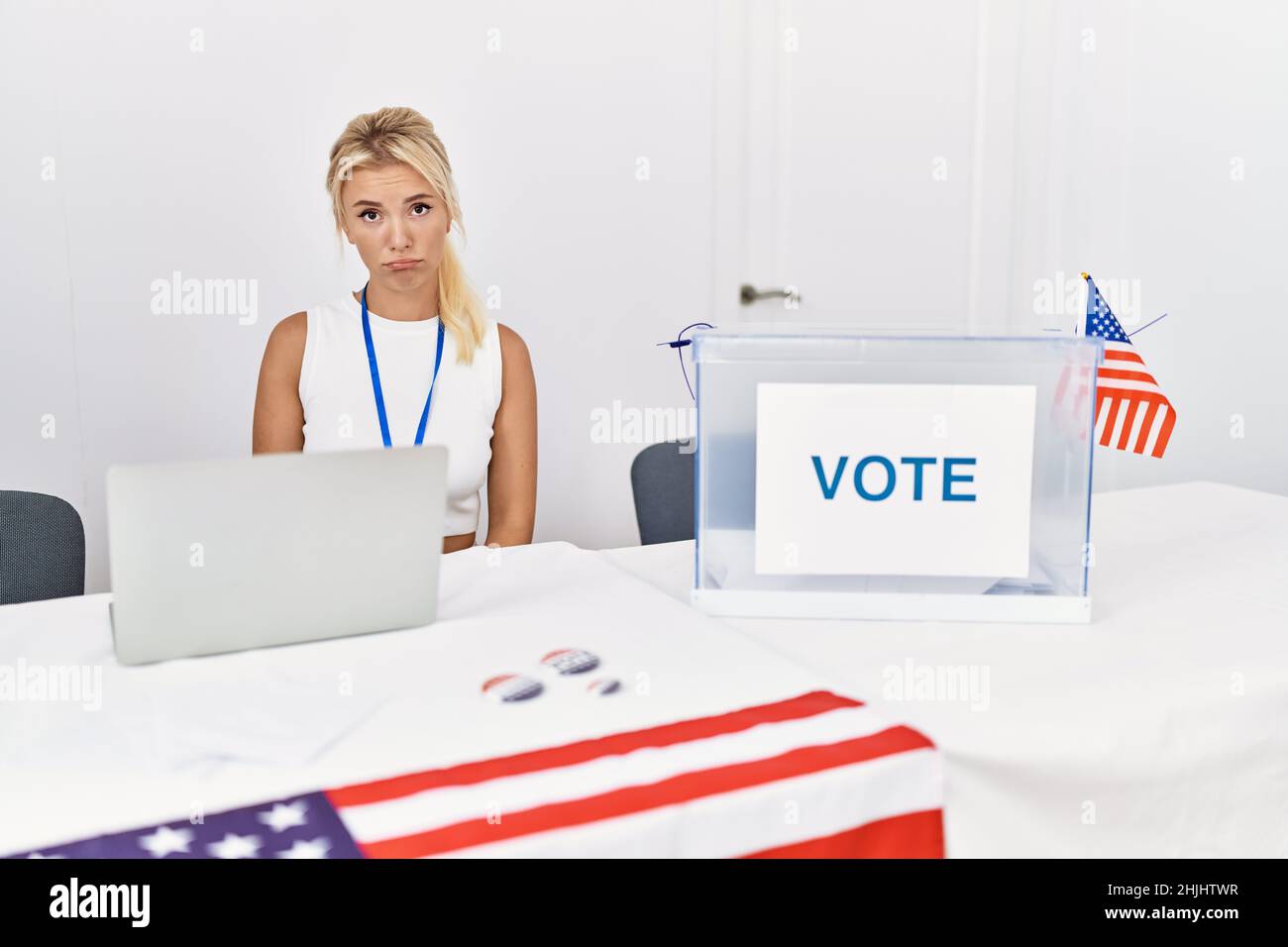 Young caucasian woman at america political campaign election depressed ...