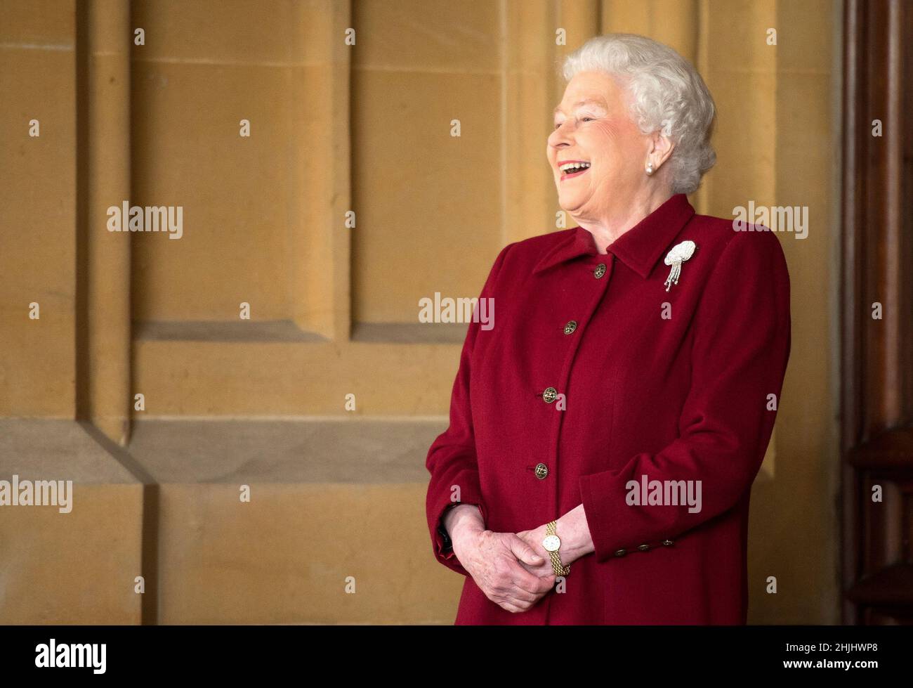 File photo dated 11/04/14 of Queen Elizabeth II reacting as Irish ...