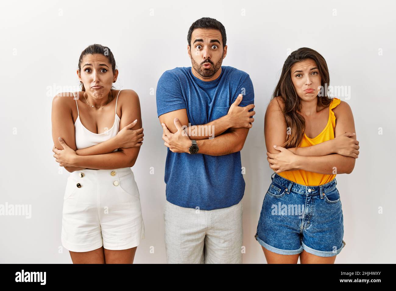 Group of young hispanic people standing over isolated background ...