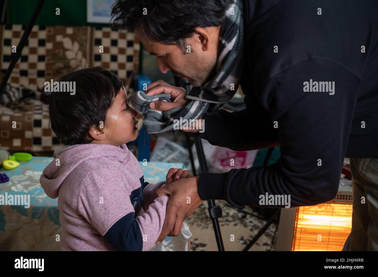 when the child gets hurt , his father lovingly brings it from him and ...