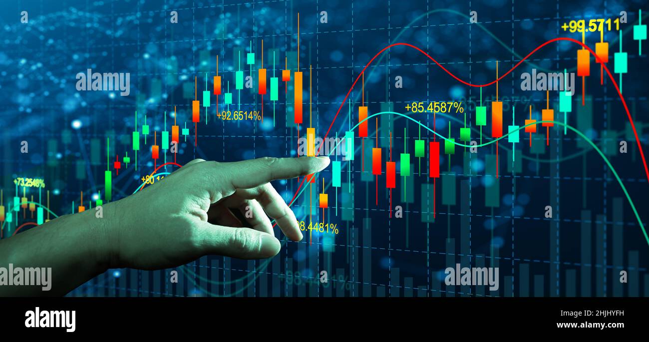 Double exposure of Business man hand on digital stock market financial ...