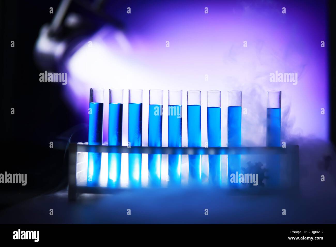 Test tube of glass overflows new liquid solution potassium blue ...