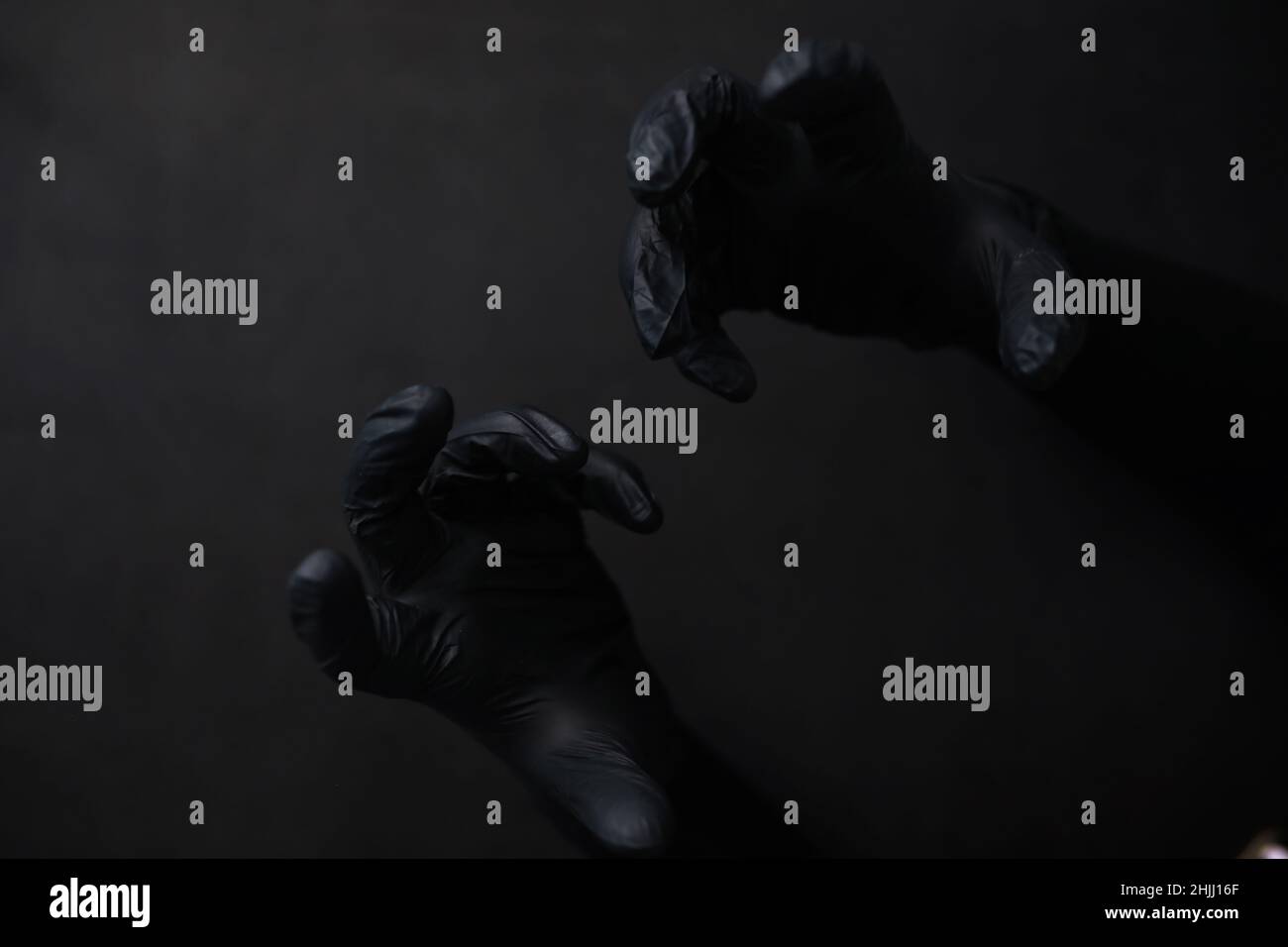 Background of hands in gloves. Black gloves. Hand gestures black gloves ...