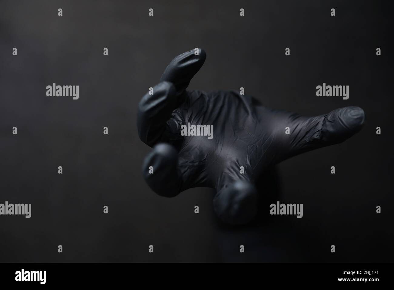 Background of hands in gloves. Black gloves. Hand gestures black gloves ...