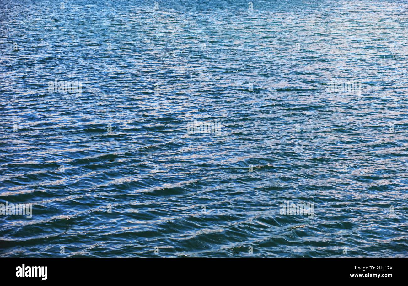Water surface. The texture of the water. Waves on the lake windy ...