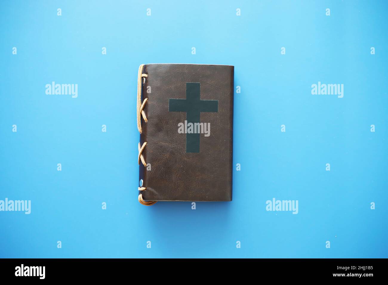 Book with the symbol the cross. Bible study. Religious book. Prayer ...