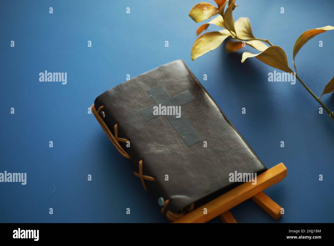Book with the symbol the cross. Bible study. Religious book. Prayer ...