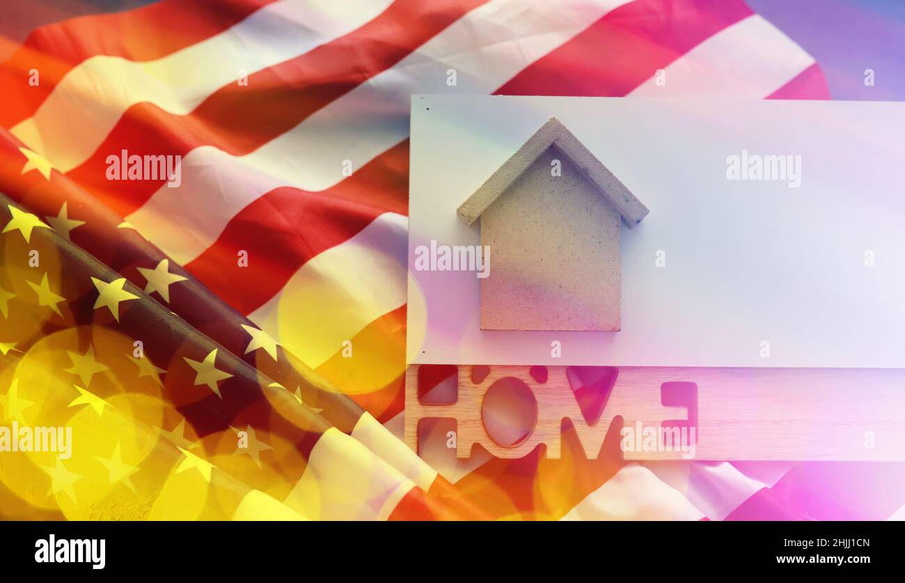 House symbol on American flag. Mortgage credit lending. Housing safety ...
