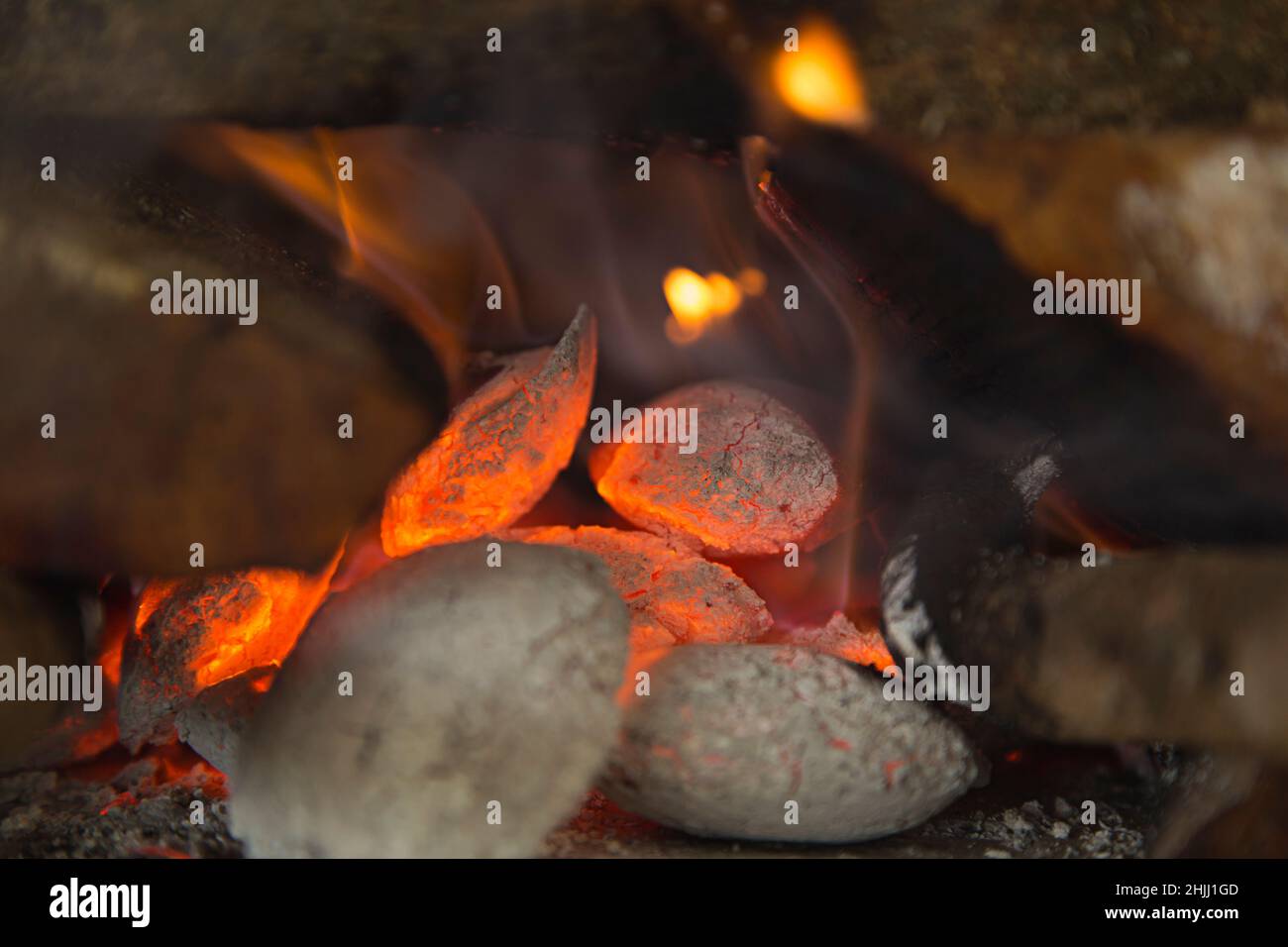 Coal Briquettes burning in the fire Stock Photo - Alamy