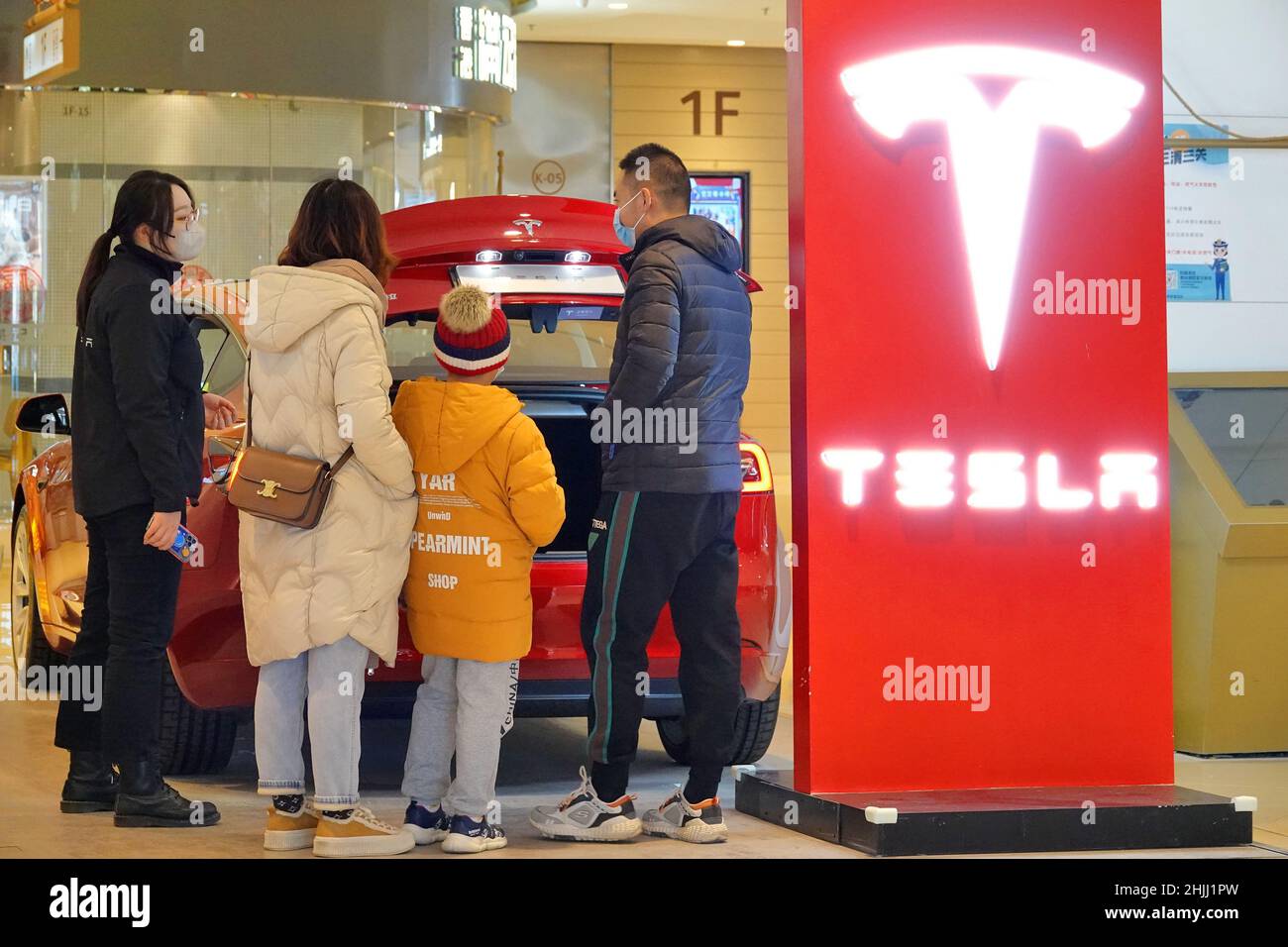 YANTAI, CHINA - JANUARY 30, 2022 - Customers choose a car at a Tesla ...