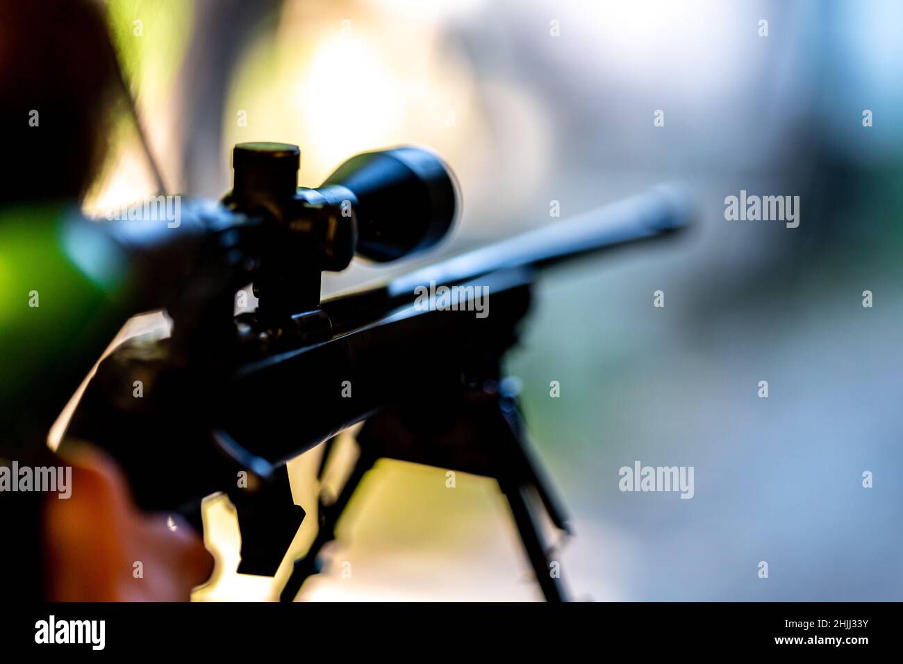 Sniper with weapons ready to fight Stock Photo - Alamy