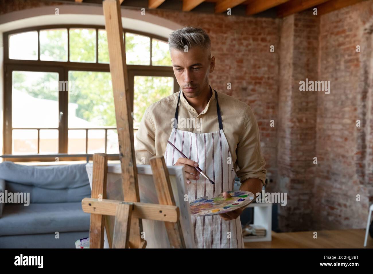 Man artist drawing in studio hi-res stock photography and images - Alamy