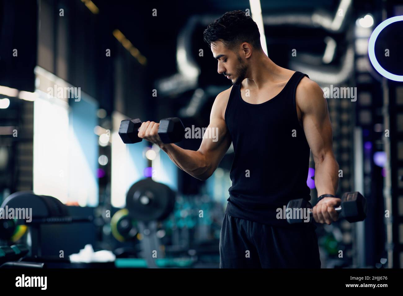 Portrait Of Young Middle Eastern Male Bodybuilder Training With ...