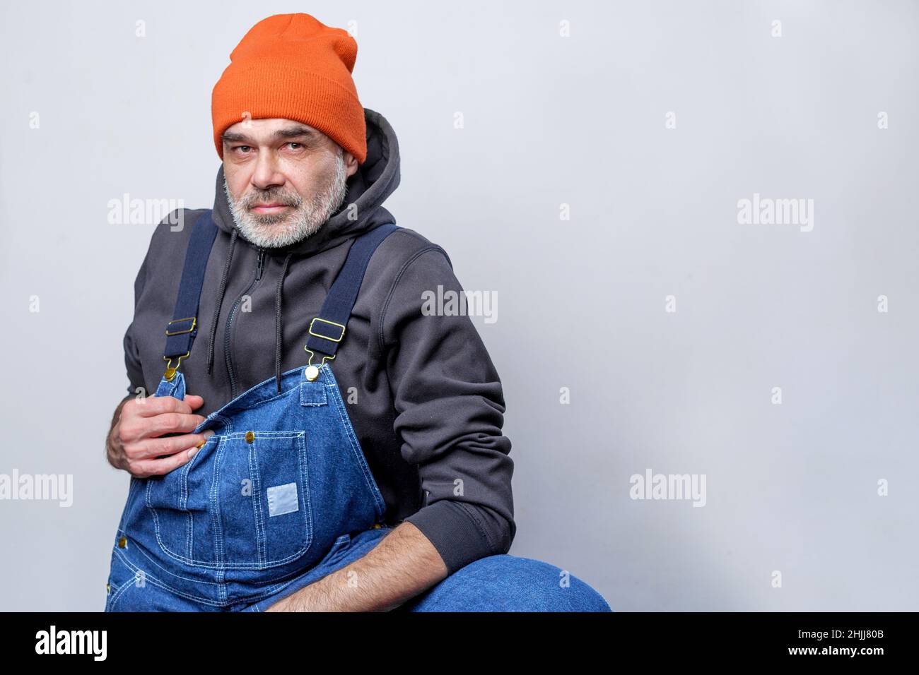 Portrait of a male worker in overalls. Bluecollar man Stock Photo - Alamy