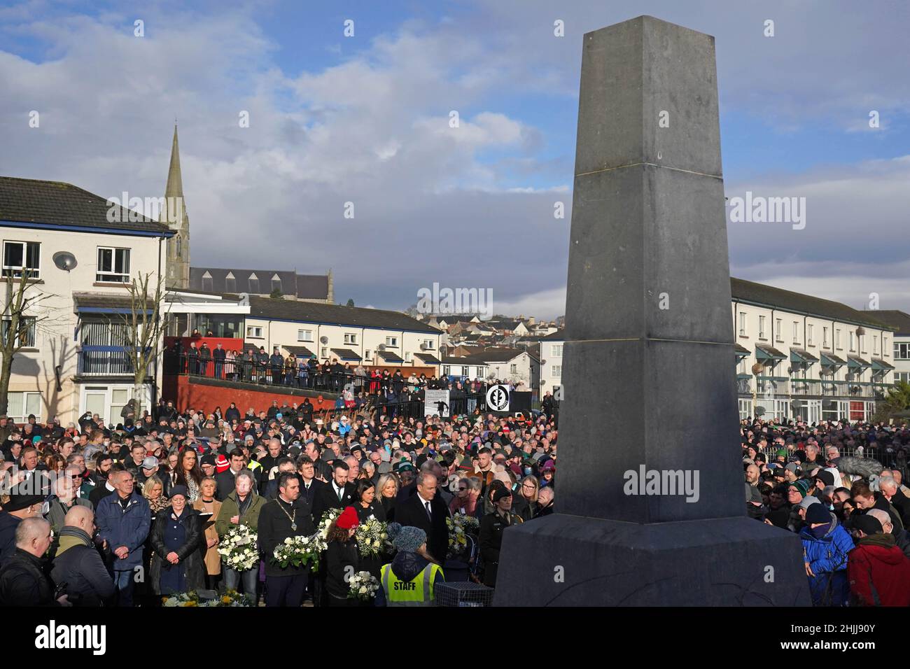 People at a wreath laying ceremony at the Bloody Sunday Memorial in ...