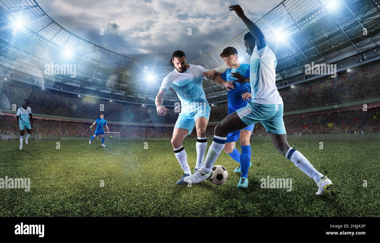 Football scene with competing soccer players at the stadium Stock Photo ...