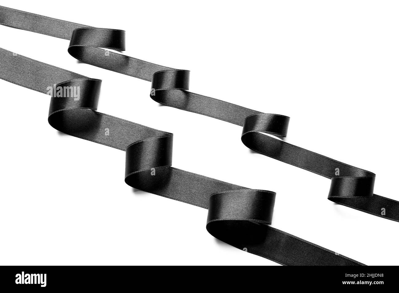 Black ribbons isolated on white Stock Photo - Alamy