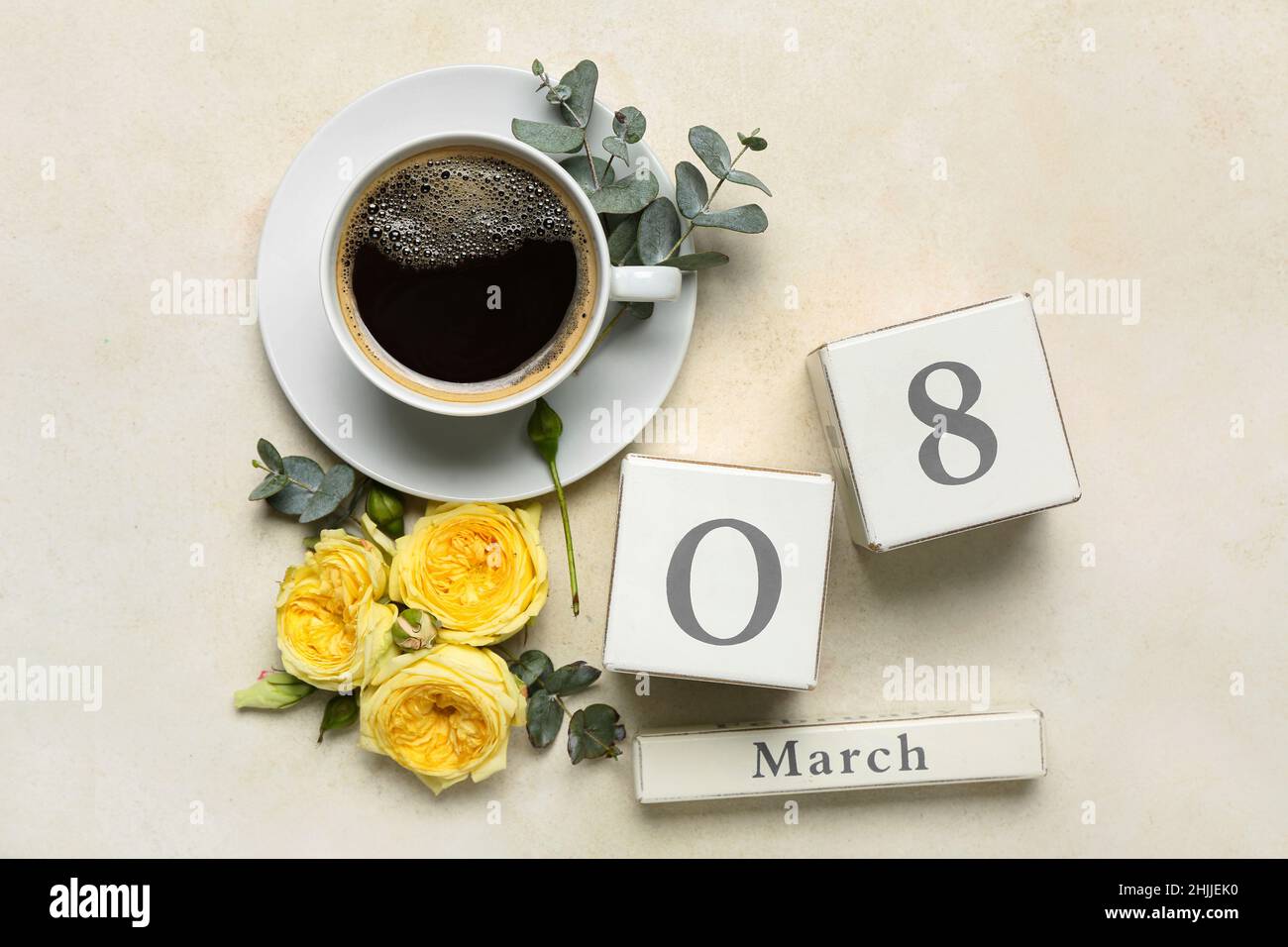 Calendar, cup of coffee and flowers for International Women's Day ...