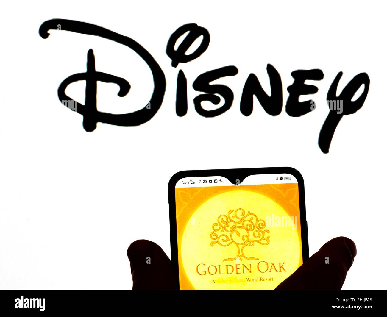 In this photo illustration, the Golden Oak Ranch logo is seen displayed ...