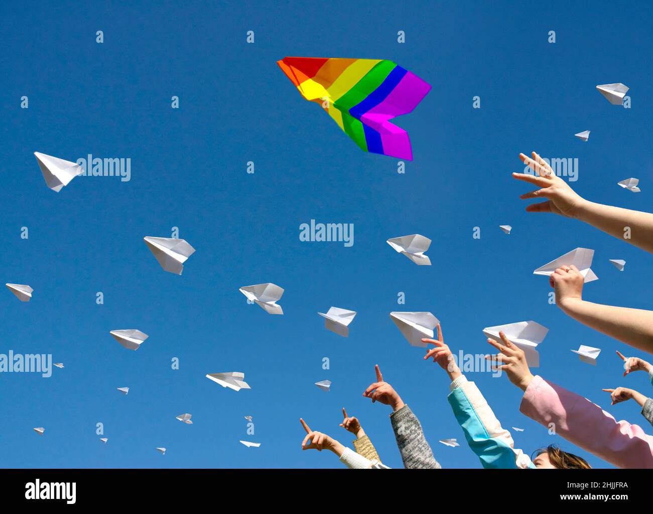 People's hands throw up messages in the manner of paper airplanes. One ...
