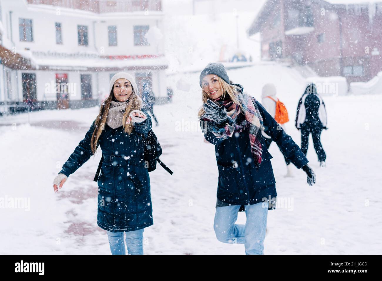 Throwing snowballs hi-res stock photography and images - Alamy