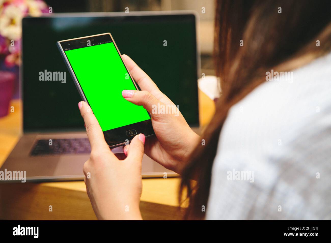 Lady hands using green screen hi-res stock photography and images - Alamy
