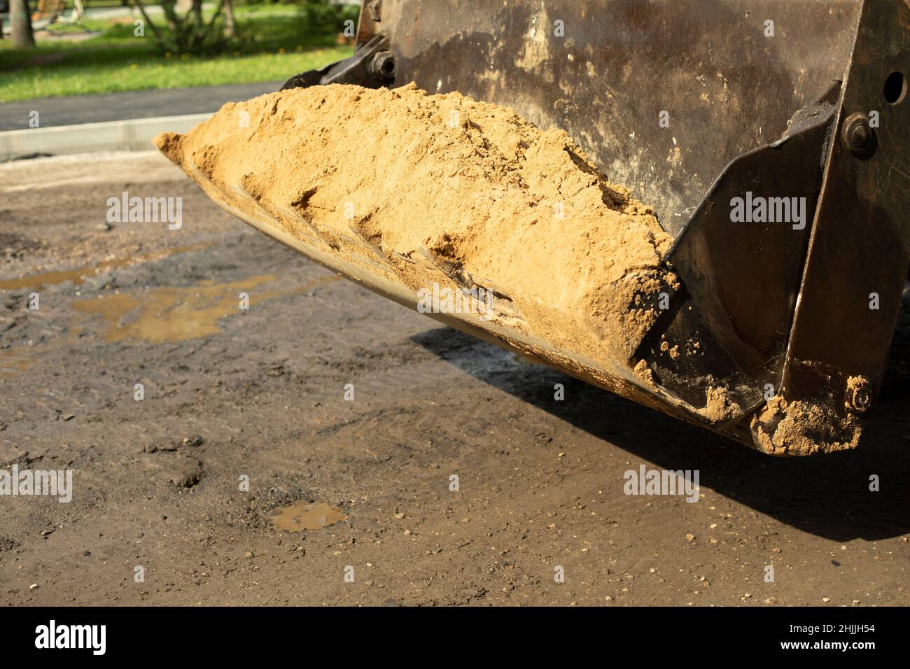 Heavy machinery at construction site. Details of embankment ...