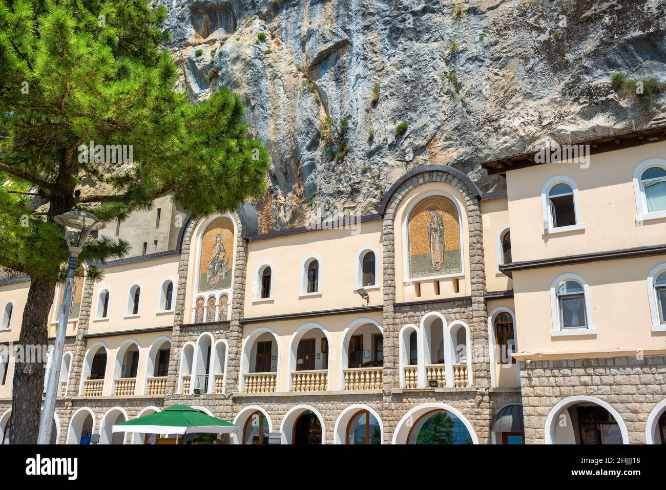 Old monastery of Ostrog built into a mountain in Montenegro Stock Photo ...