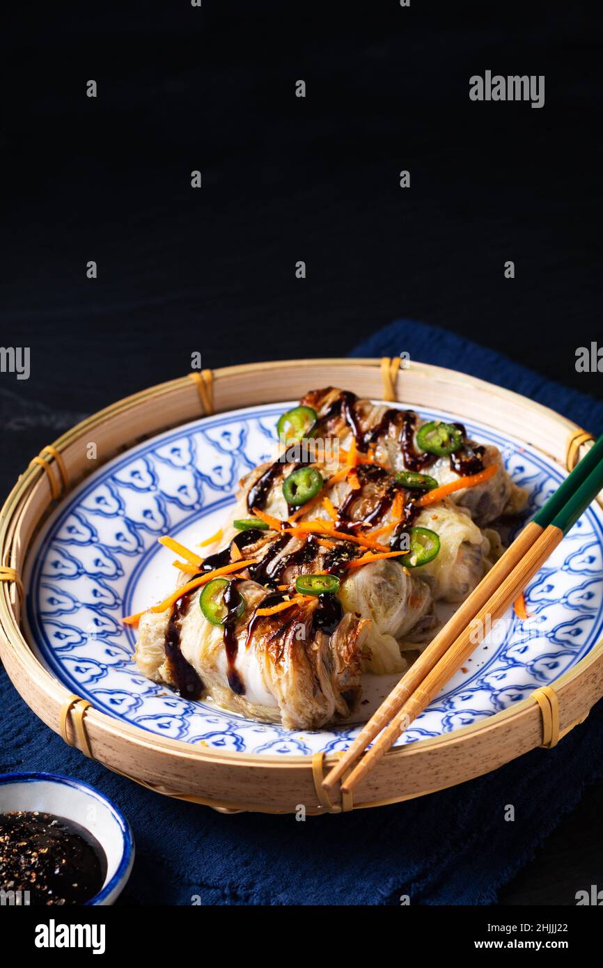 Food concept Homemade baked Chinese cabbage rolls in asian style ...