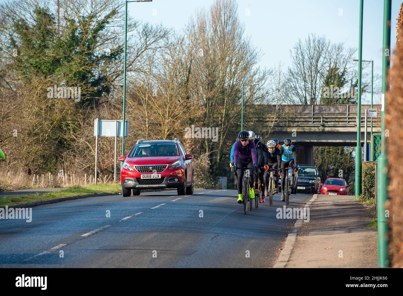 Car overtaking cycle hi-res stock photography and images - Alamy