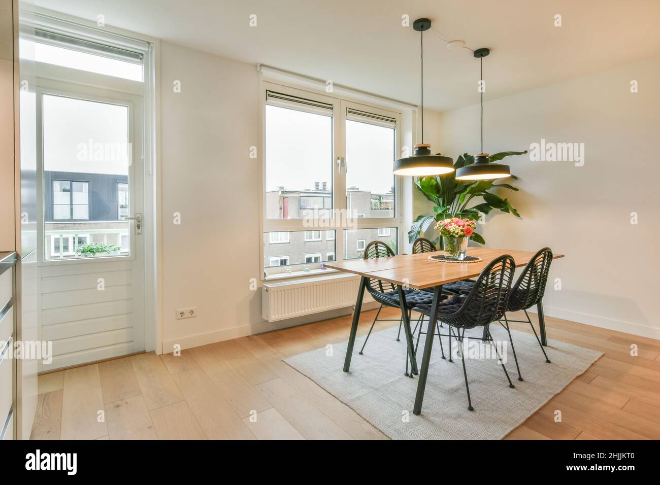Interior of dining room with stylish table and chairs Stock Photo - Alamy
