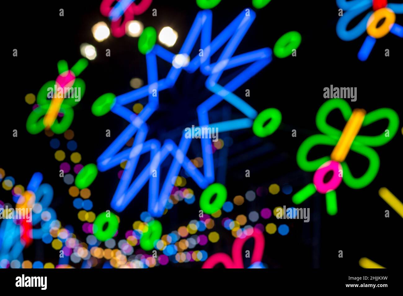 Blured Multi-colored neon lights at night Stock Photo - Alamy