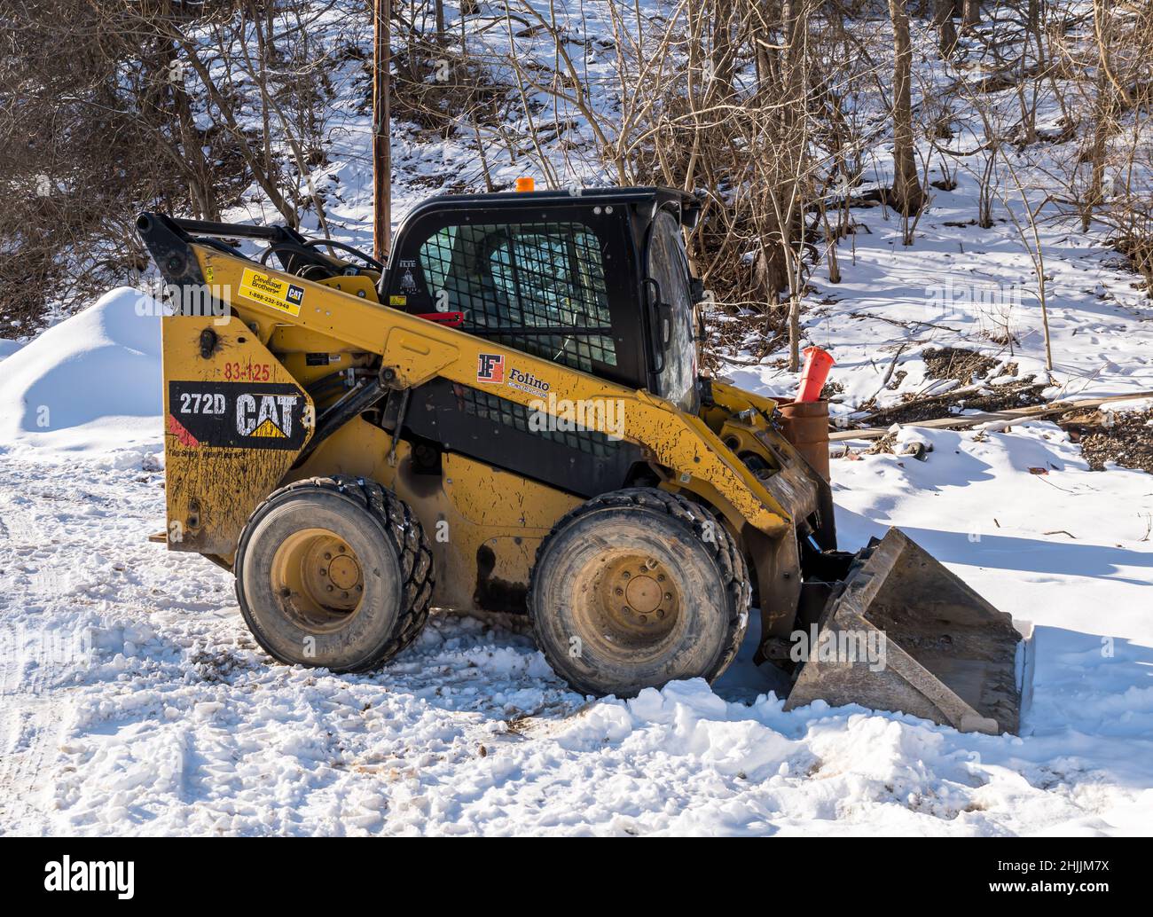 A Peterson Cat 272D Skid Steer Loader parked in the snow in Frick Park ...
