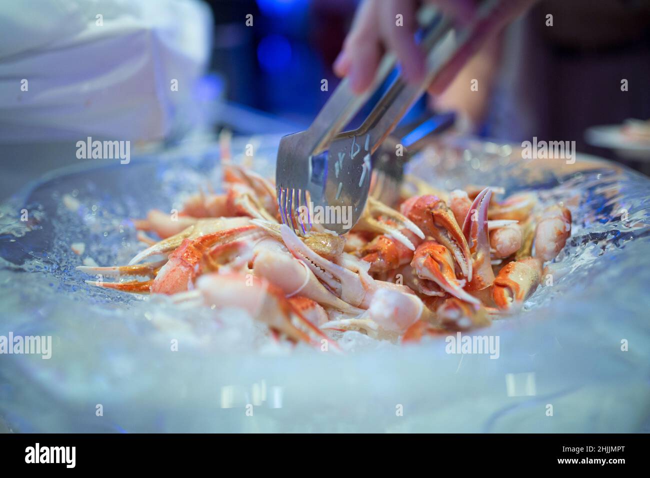 Hand grabbing fish hi-res stock photography and images - Alamy