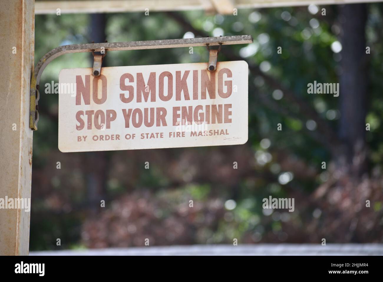 No Smoking signboard hang on a metallic pipe Stock Photo - Alamy
