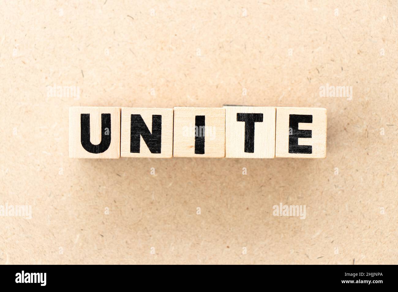 Alphabet letter block in word unite on wood background Stock Photo - Alamy