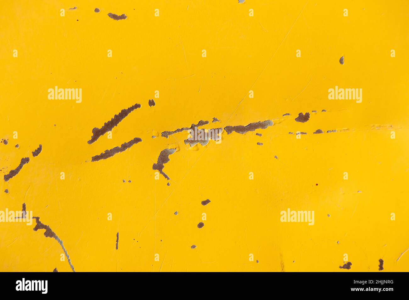 Rust scratch on old yellow color metal plate background Stock Photo - Alamy