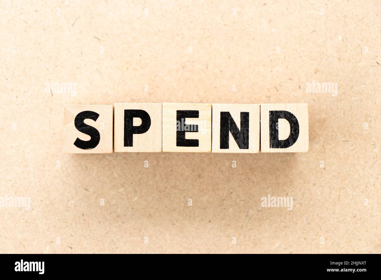 Alphabet letter block in word spend on wood background Stock Photo - Alamy