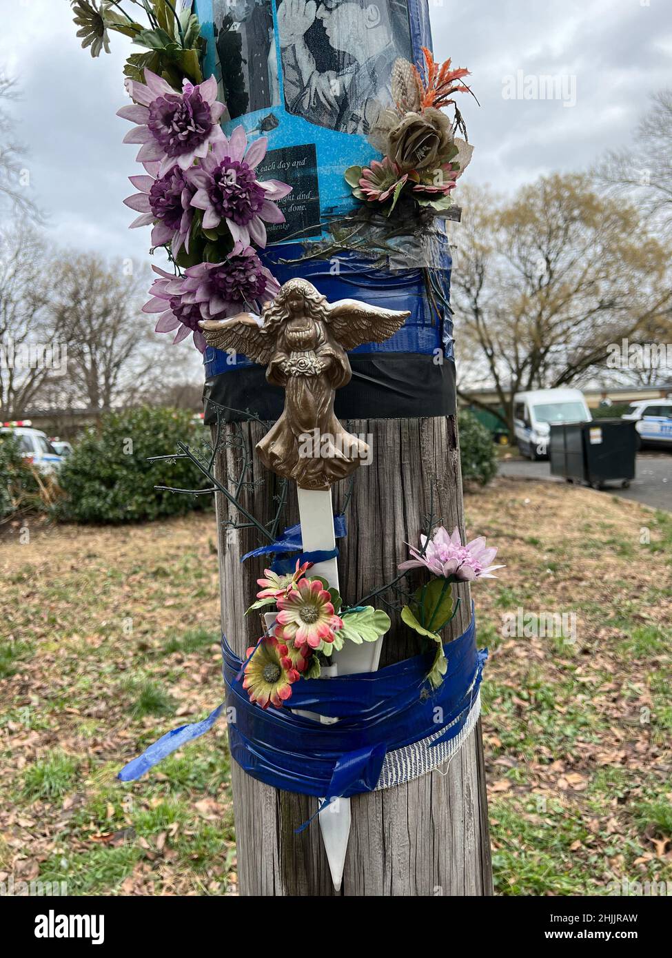 Neighborhood memorial on a light pole near a police precinct for fallen ...