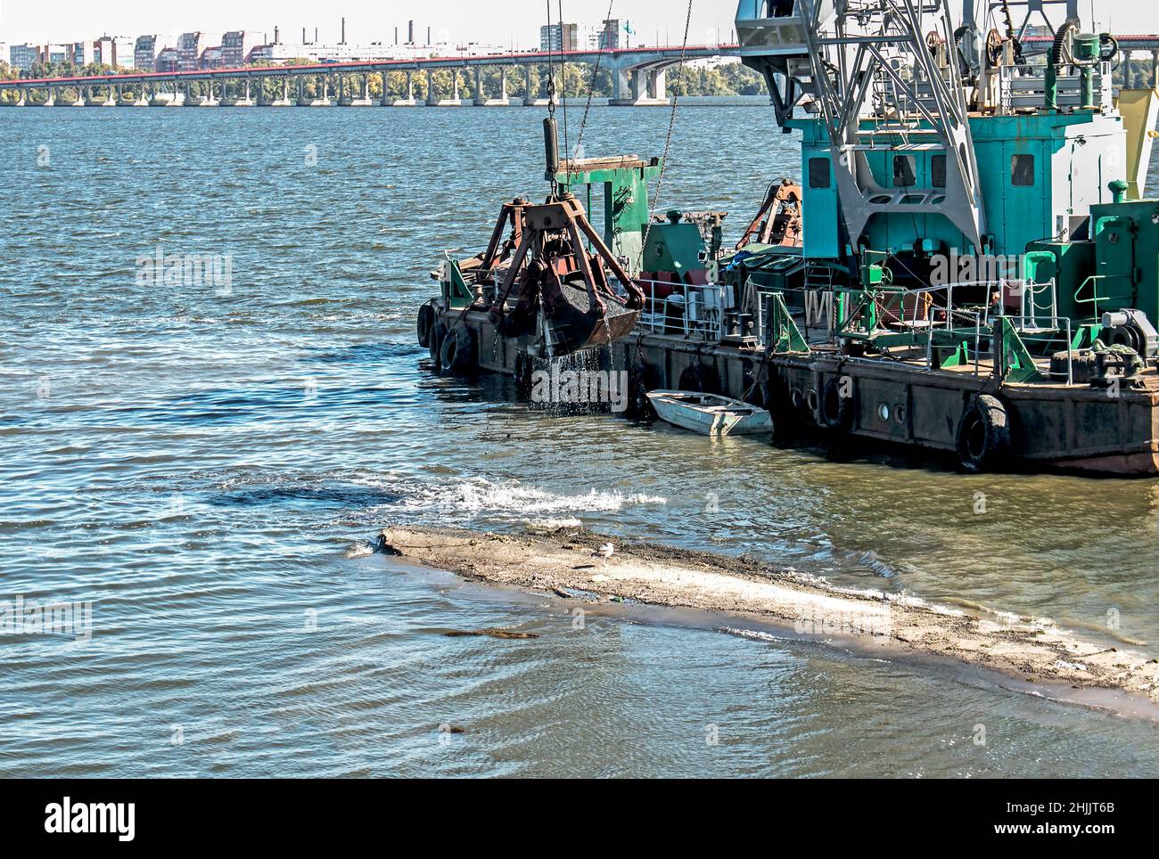 Cleaning the newly formed island from industrial waste on the Dnieper ...