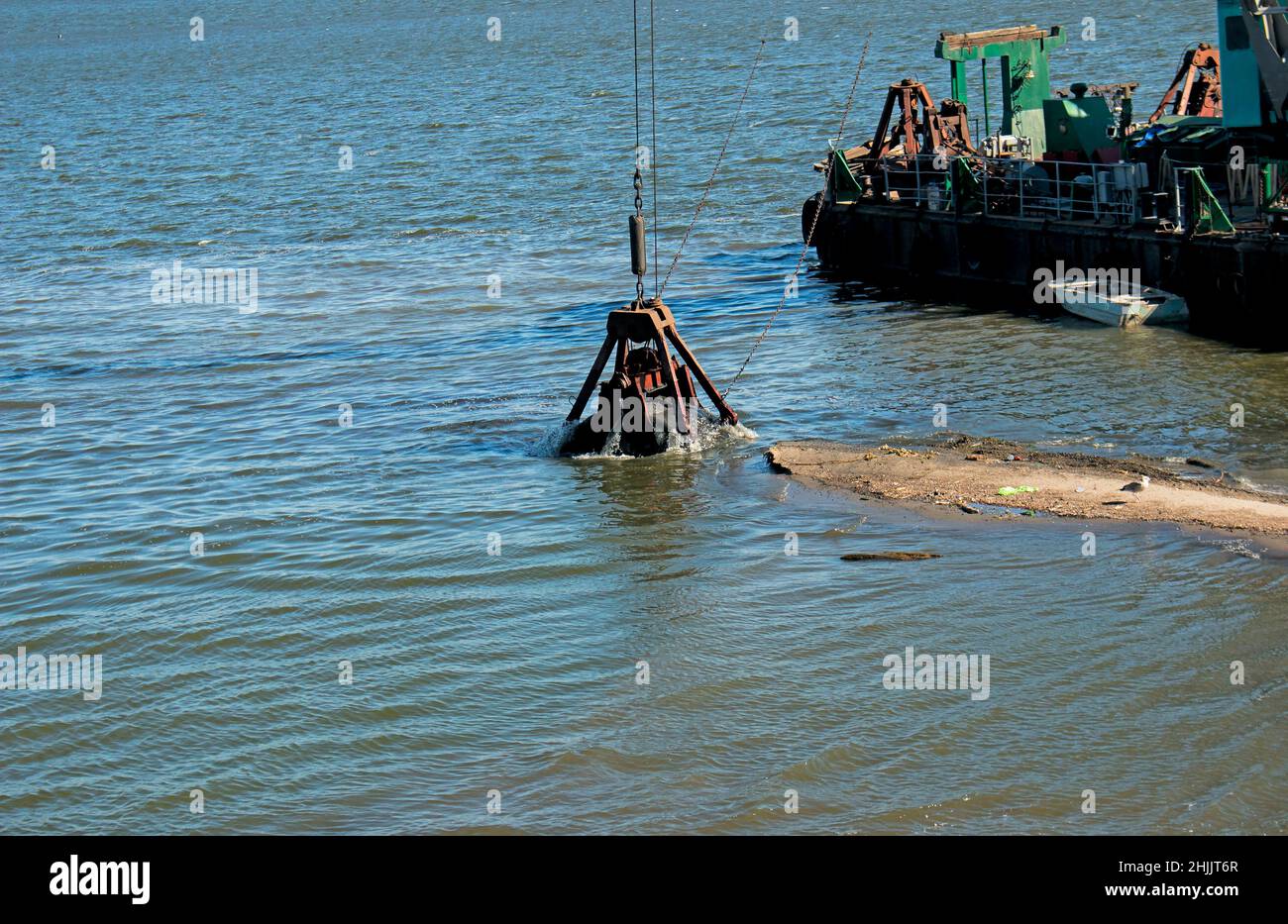 Cleaning the newly formed island from industrial waste on the Dnieper ...