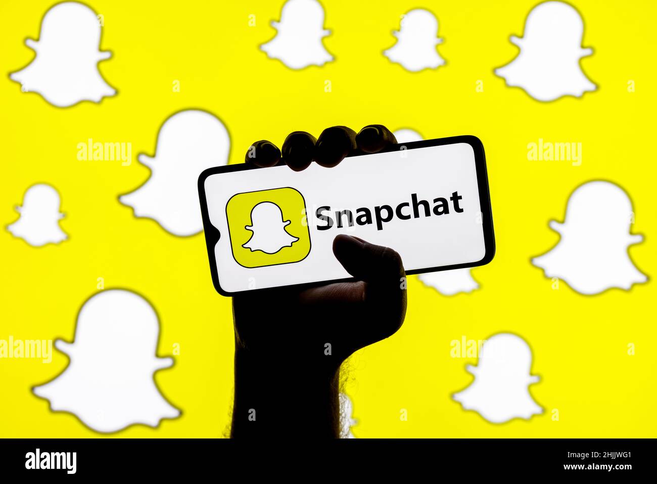 Smartphone with the Snapchat instant messaging service logo on the ...