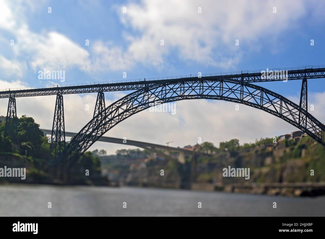 Tilt-shift effect photography. Maria Pia Bridge over the Douro river ...