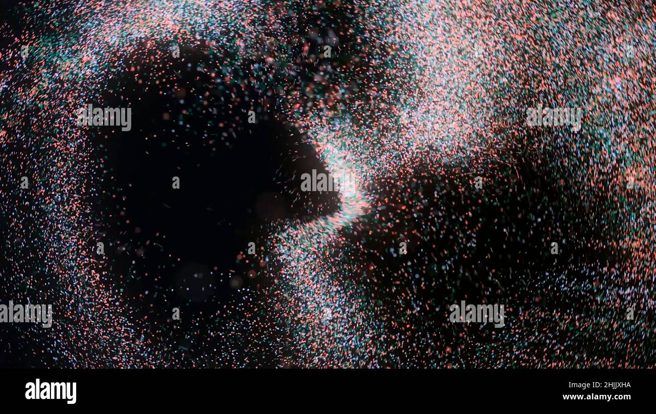 Vortex of multi-colored particles. Animation. Swirl of many colored ...