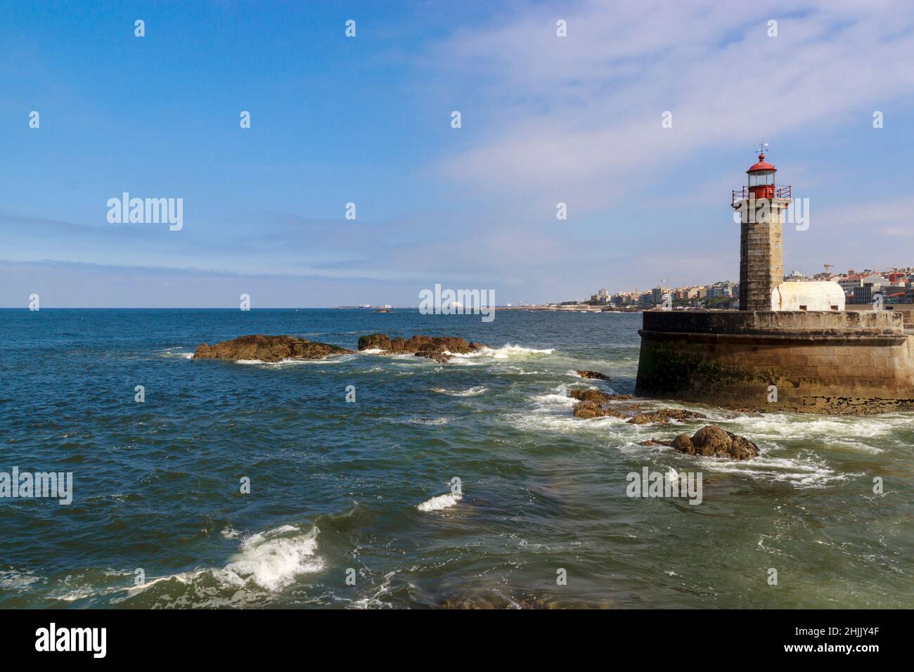 Lighthouse in Foz do Douro at the mouth of the river Douro in Porto ...