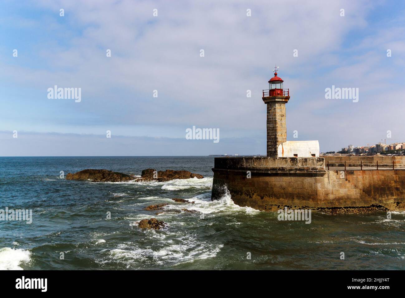 Lighthouse in Foz do Douro at the mouth of the river Douro in Porto ...