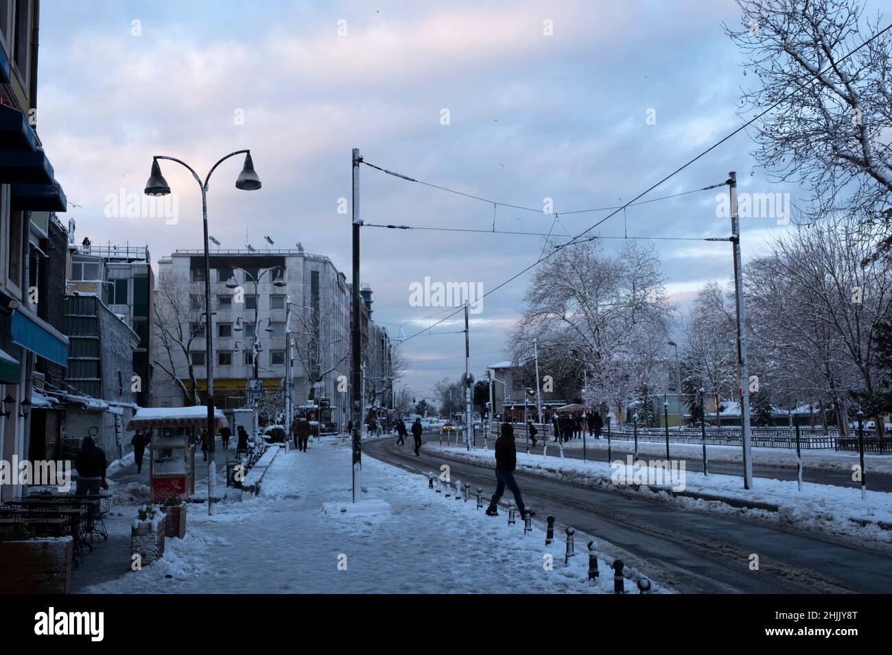 front view empty street in a snowy day Stock Photo - Alamy