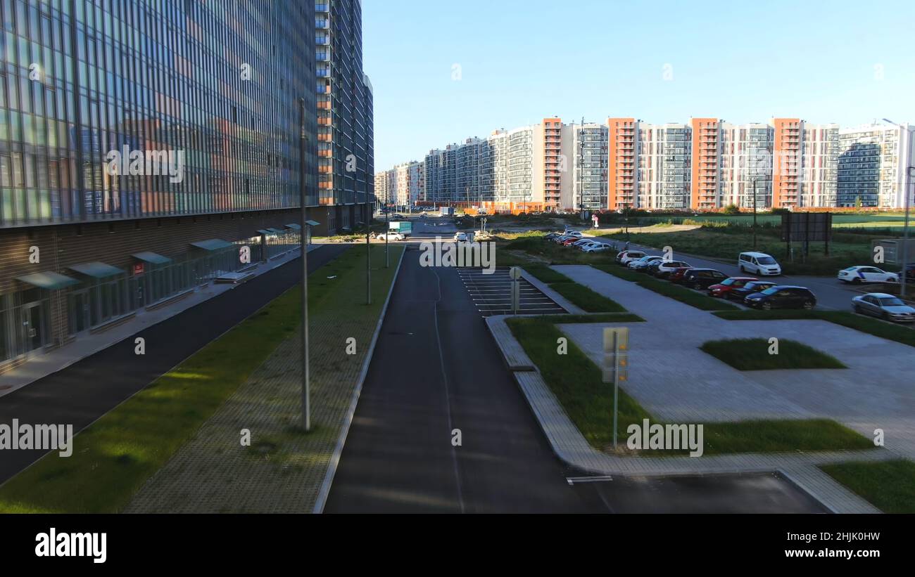Aerial view of road and parking near the new apartment residential ...