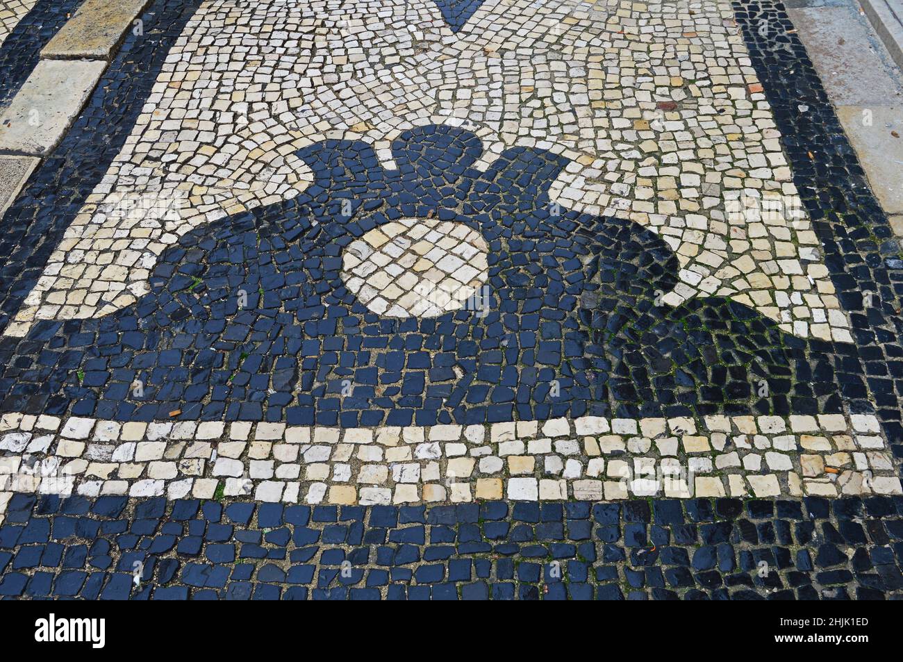 Traditional portuguese stone mosaic calcade with basalt and limestone ...