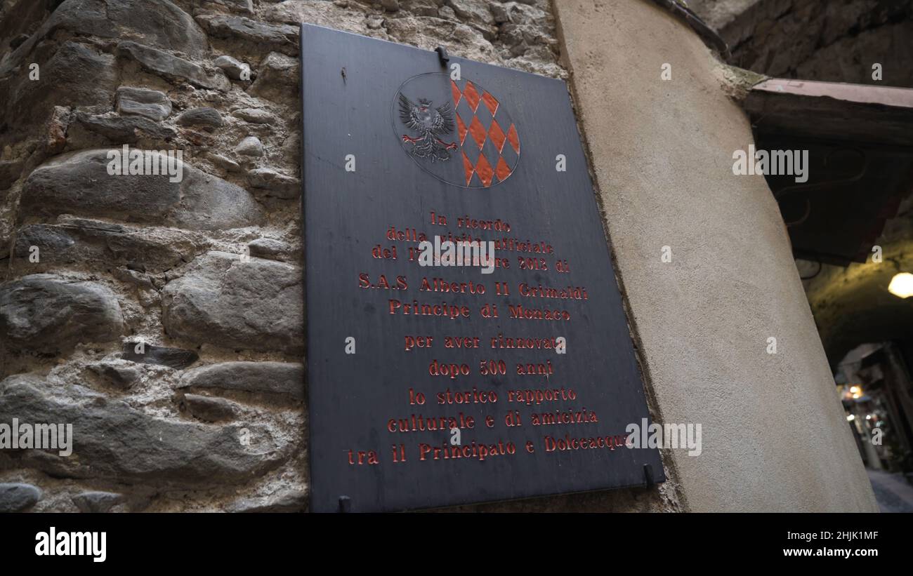 Sign with inscriptions at entrance to castle. Action. Beautiful black ...